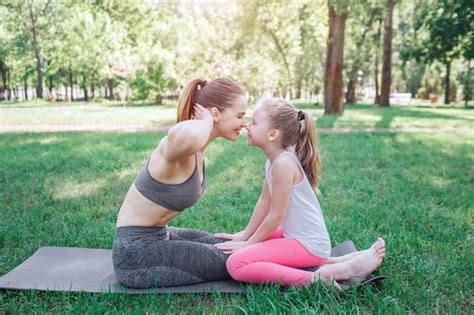Premium Photo Mom And Daughter Sitting Together Face To Face