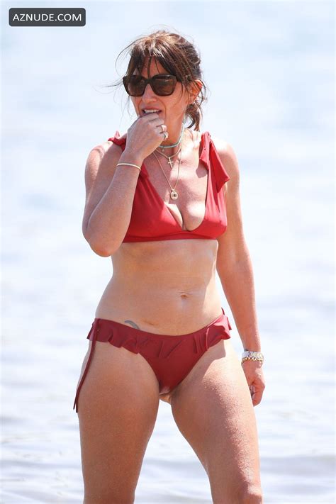 Davina Mccall Pictured Enjoying Another Sunny Beach Day Wearing A Red