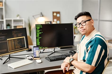 Premium Photo Portrait Of Asian It Developer Looking At Camera