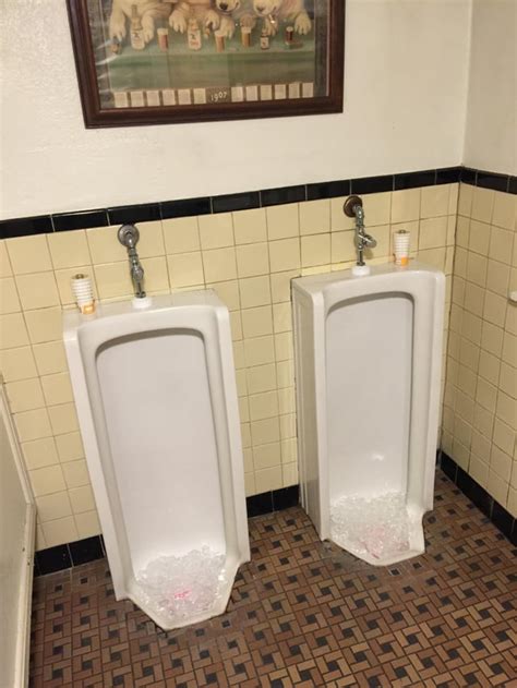 This Private Club I Visited Keeps Ice In Their Antique Urinals To Hold