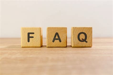 Frequently Asked Questions Or FAQ Written On Wooden Blocks Stock Photo