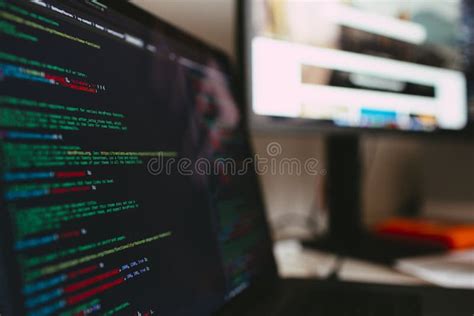 Closeup Of Computer Code On The Screen With A Blurry Background Stock