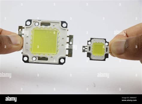 High Power Smd White Lighting Leds Of Different Sizes Held In The Hand