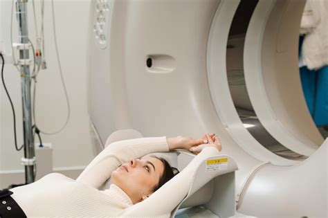 Premium Photo Girl Patient Lies On Computed Tomography Bed And Scanning Lungs For Diagnose
