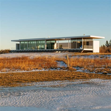 Two Angular Wings Form Quebec Chalet By Atelier Pierre Thibault