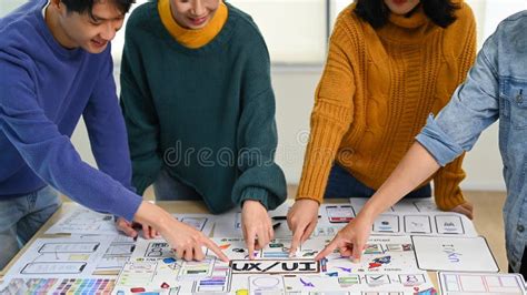 Team Of Creative Designer Working On App Design And User Interface Developing Mobile