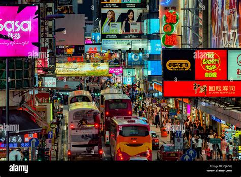 Neon Signs And Billboards Along The Crowded And Busy City Streets Hong