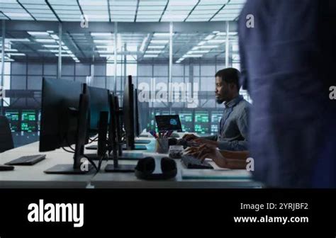 Admin Arriving In Server Room Starting Work On Developing Disaster Recovery Plans Ensuring