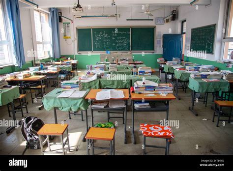 Chinese Classroom With Desks With Books At Middle School In Zhaozhou
