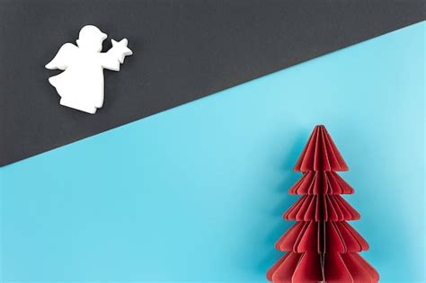 Premium Photo Christmas Background With Origami Paper Tree On Paper