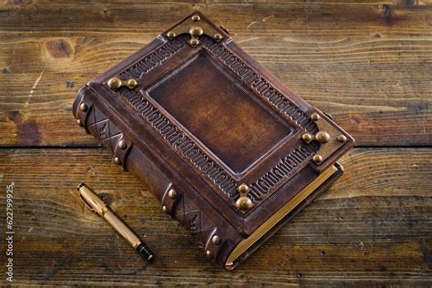 Aged Leather Book Cover Design With Embossed Ambigram Memento Mori