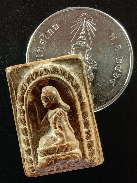 นางกวักหลังยันต์ เฑาะว์ เนื้อดิน Id 5273594835763200 พระเนื้อดิน และหลวงพ่อปาน ประมูลพระ