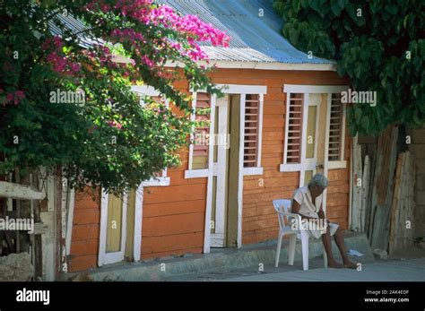 Dominican Republic An Elderly Woman Is Enjoying The Chill Of The
