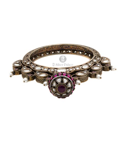 Oxidised Silver Peacock Kada Featuring With Rubies And Emeralds