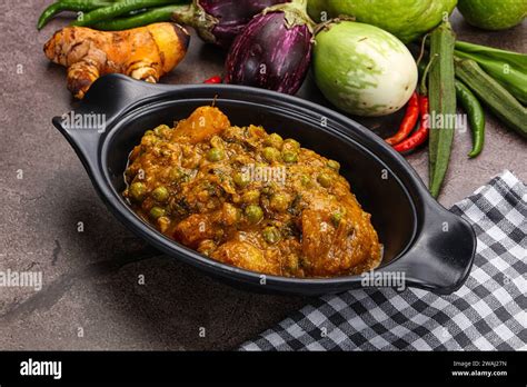 Indian Traditional Cuisine Aloo Mutter Potato With Green Peas Stock