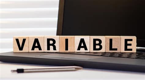 Premium Photo Variable Word Made With Building Blocks