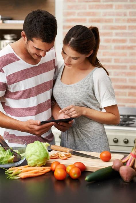 Cooking Tutorial Tablet And Couple In Kitchen For Healthy Food Or Vegetables For Lunch Or