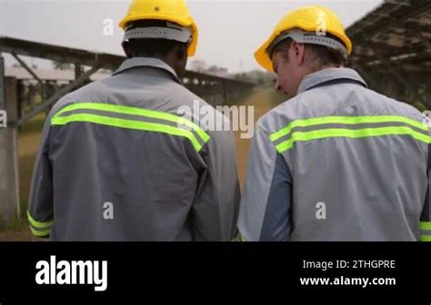 Teamwork Engineers Team Checking Security Protection System At Solar