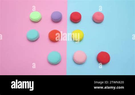 The Vivid Colour Of Macarons Placed In Rows Disappearing From The Table