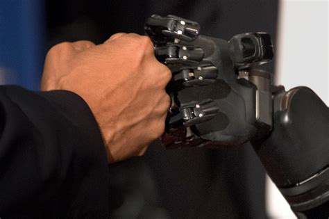 This Brain Controlled Robotic Arm Can Twist Grasp—and Feel Wired