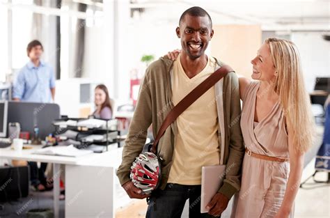 Premium Photo | Business people office and man with woman hug and ...