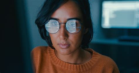 Female Computer Programmer Works On Complex Software Development Tasks