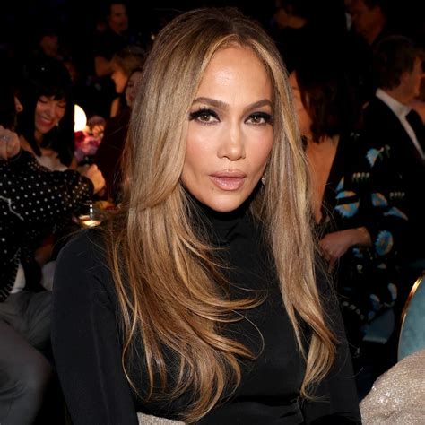 Jennifer Lopez Stuns In Plunging Gown During Pre Grammys Party Appearance