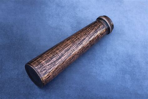 janak copper pyramid bottle antique carving criss cross janak ktp