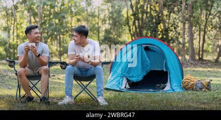 Male Gay Couple Asian Traveling With Tent Camping Outdoor And Various