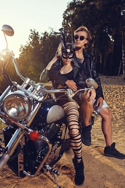 Premium Photo Sexy Couple Of Bikers On The Vintage Custom Motorcycle Girl In A Rabbit Mask