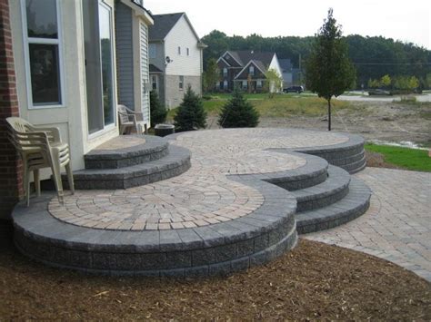 Pin By Erika B On Porch Raised Patio Brick Patios Concrete Patio