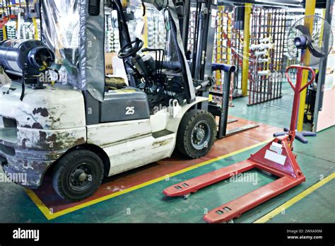 Factory Warehouse And Forklift Or Industrial Vehicle Loading Or