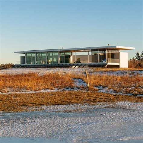 Two Angular Wings Form Quebec Chalet By Atelier Pierre Thibault