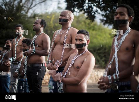 Jerusalem Th Jan Eritrean Refugees Acting As Slaves Pose With Chains And Price