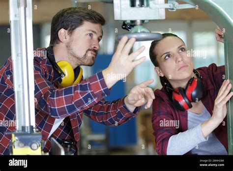 Man And Woman With Machine Cnc Stock Photo Alamy