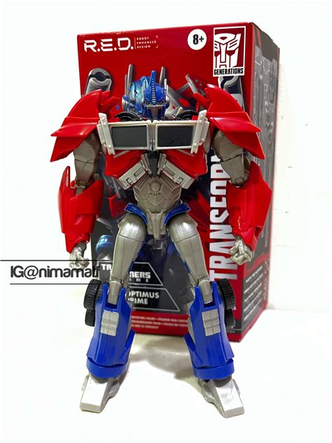 Transformers R E D Transformers Prime Optimus Prime And Megatron In Hand Images Transformers