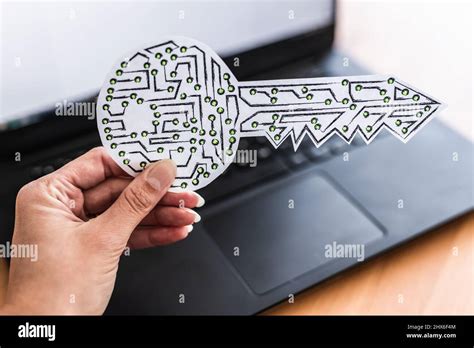 hand holding encryption key icon made of circuits and led lights in
