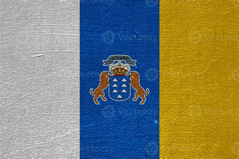 Flag And Coat Of Arms Of Canary Islands On A Textured Background