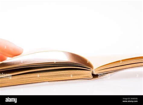 Hand Holding A Notebook On A White Background Stock Photo Alamy