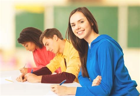 Premium Photo Group Of Students Takes The Test In Class