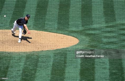 Pitcher Tim Hudson Of The Oakland Athletics Throws A Pitch During The