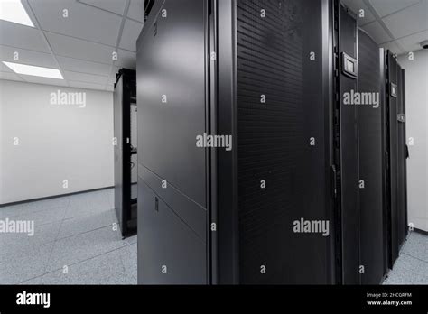 Data Center With Multiple Rows Of Fully Operational Server Racks Modern Telecommunications