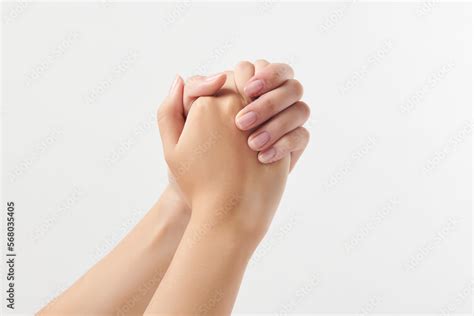 두손을 모아 기도하는 동작을 연출한 여성의 손 Stock 写真 Adobe Stock