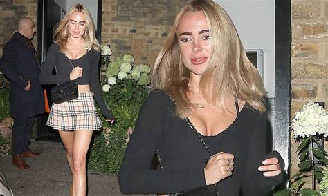 Kimberley Garner Puts On A Leggy Display In A Sexy Checked Mini Skirt