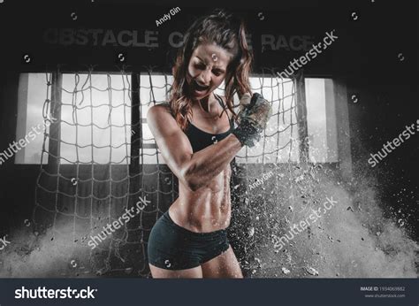 Strong Muscular Woman Flexing Her Biceps Stock Photo Shutterstock