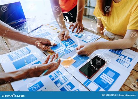 Ux Developer And Ui Designer Brainstorming About Mobile App Interface