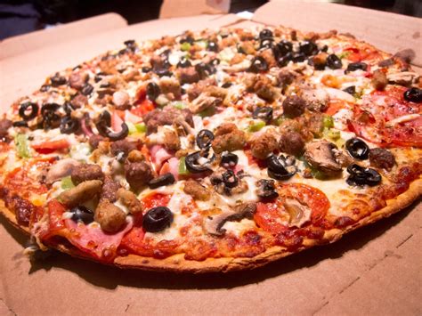 What Is On Dominos Extravaganza Pizza