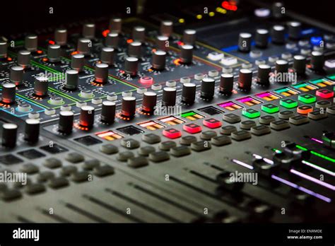 Audio Mixer Mixing Board Fader And Knobs With Selective Focus On Central Buttons Music Mixing