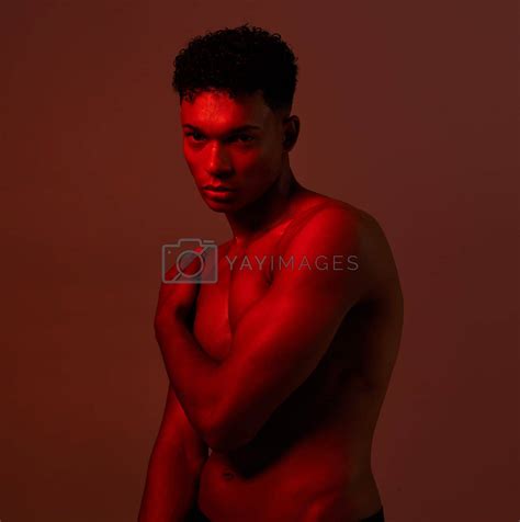 Sexy Red Light Art And Nude Of A Man Model Portrait Looking Sensual