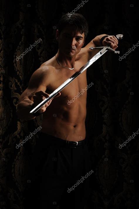 Man With Sword Stock Photo By Romancephotos